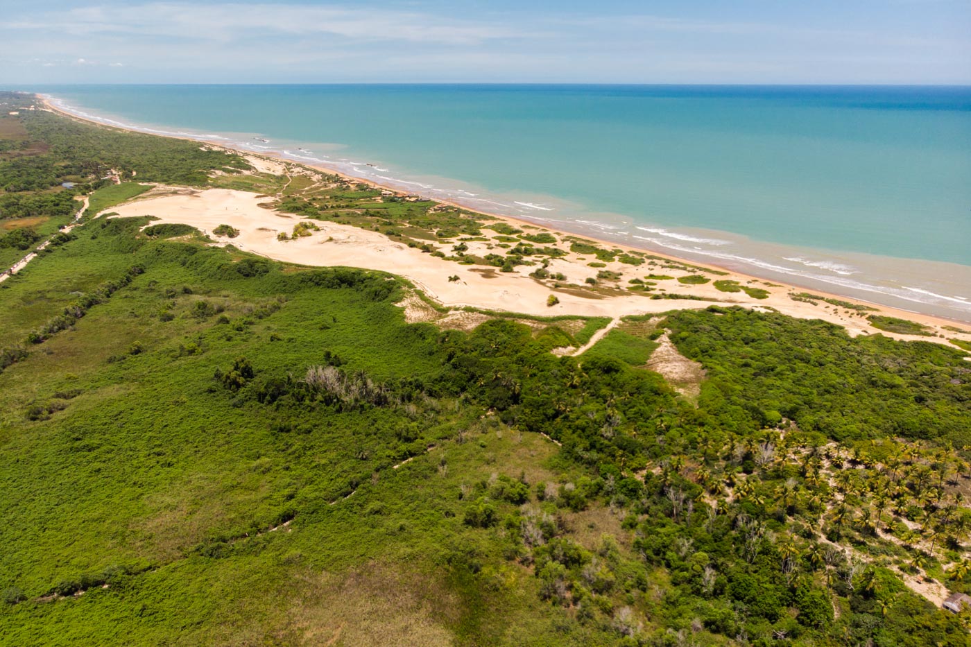 O que fazer em Itaúnas ES: praias, rio, dunas, gastronomia e o maior ...